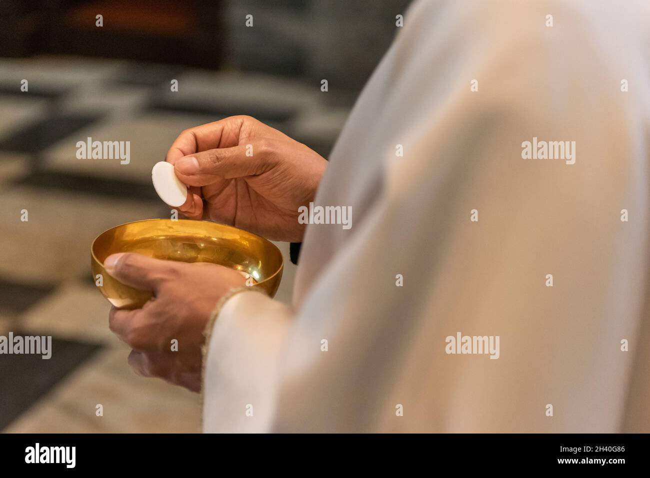The Holy Bread in the rite of Eucharist Stock Photo - Alamy