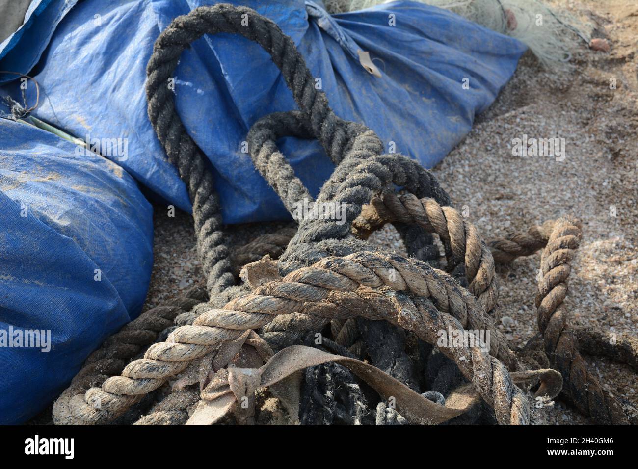 Fishing ropes. Fishing ropes and floats on a harbor. Ready for use ...