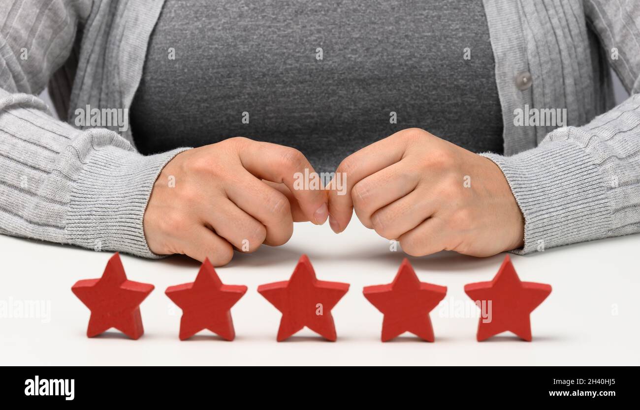 Customer experience feedback concept. Five red stars, the best rating ...