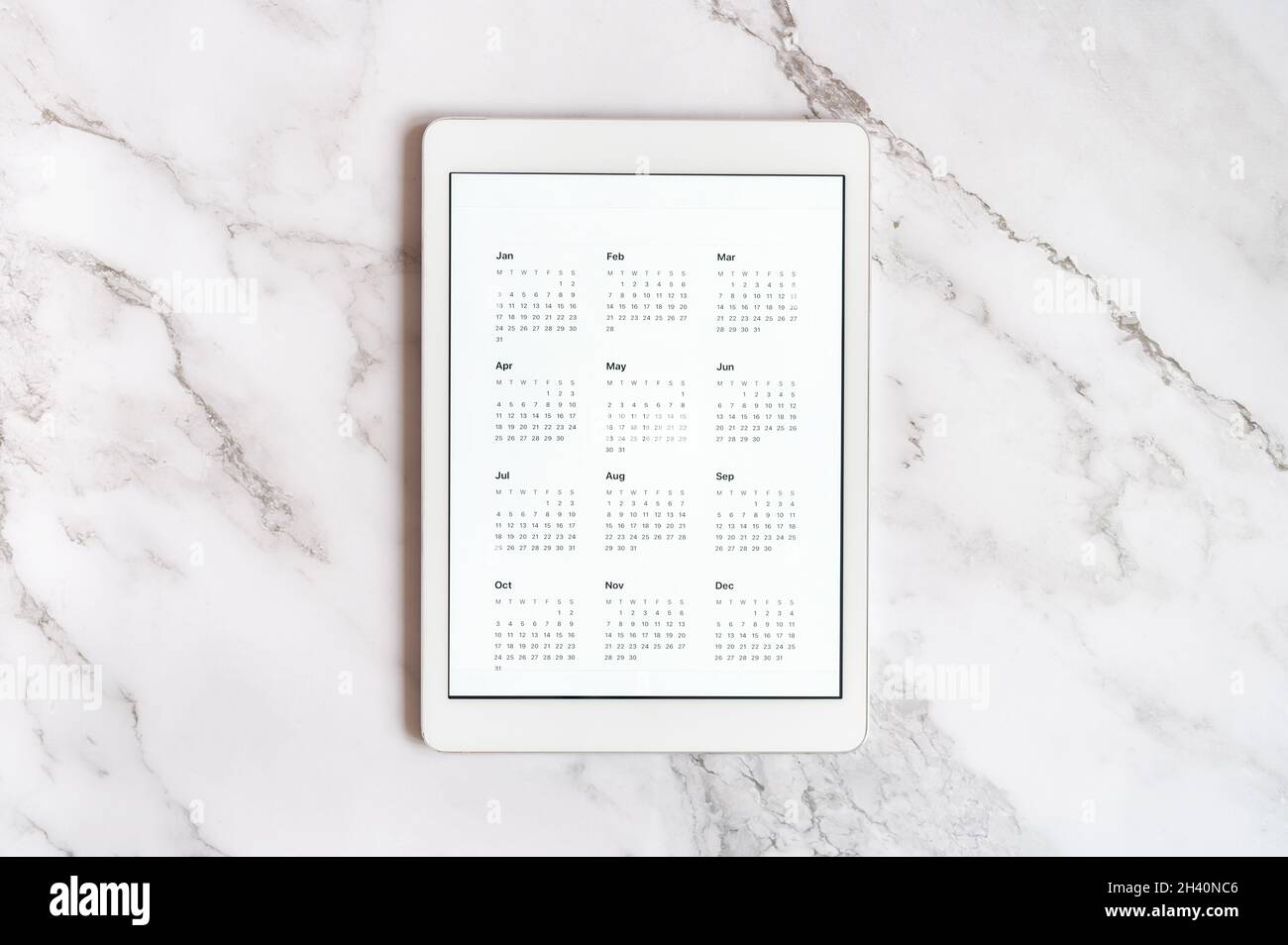 tablet computer with an open app of calendar for unspecified unknown ...