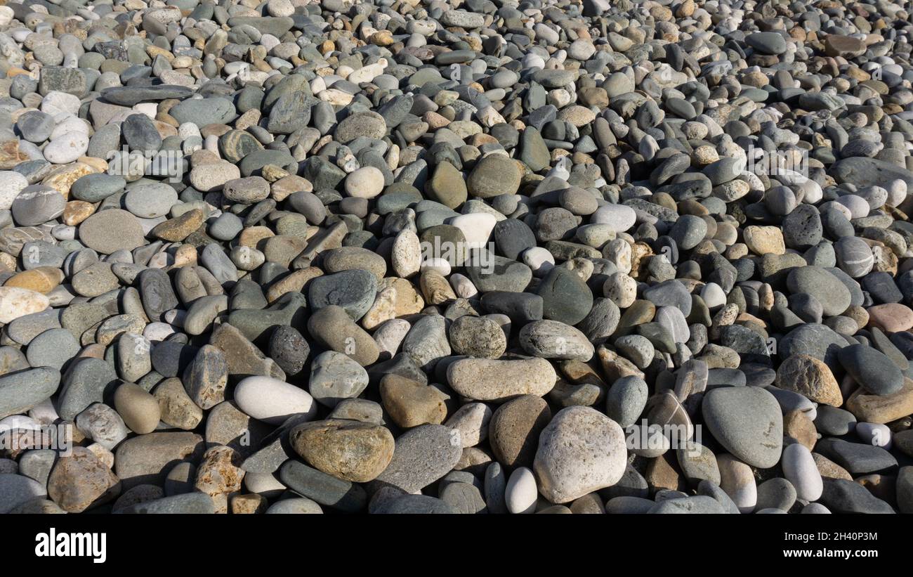 Sea stones background with small pebbles or stone in garden or in the ...