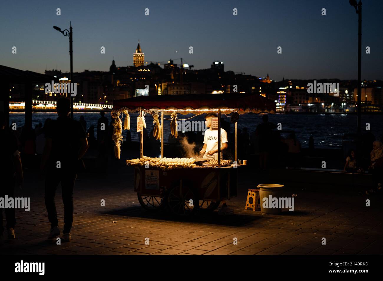 ISTANBUL, TURKEY - JULY 16, 2021: Man with illuminated mobile vendor ...