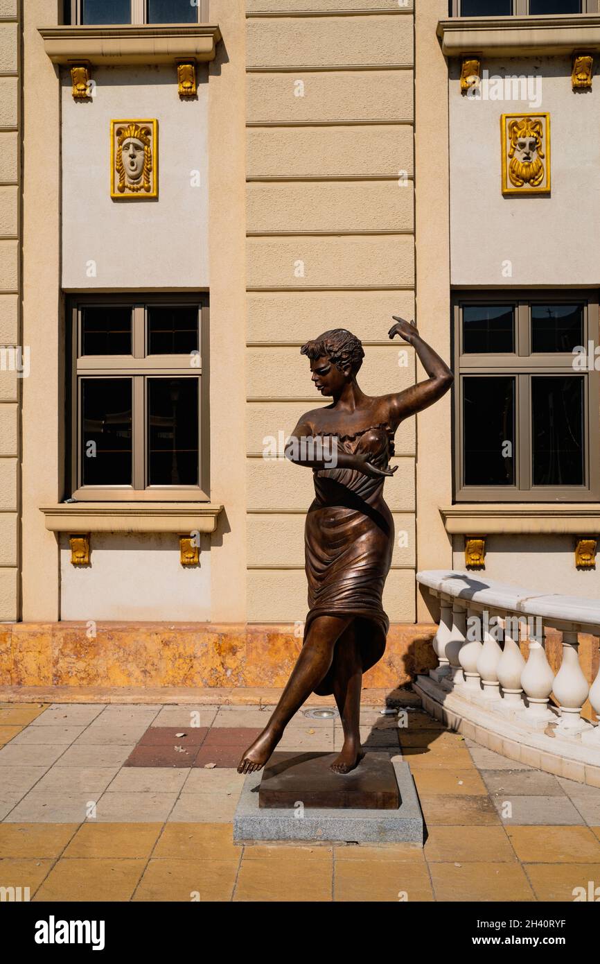 SKOPJE, NORTH MACEDONIA - AUGUST 19, 2021: Bronze sculpture of dancing ...