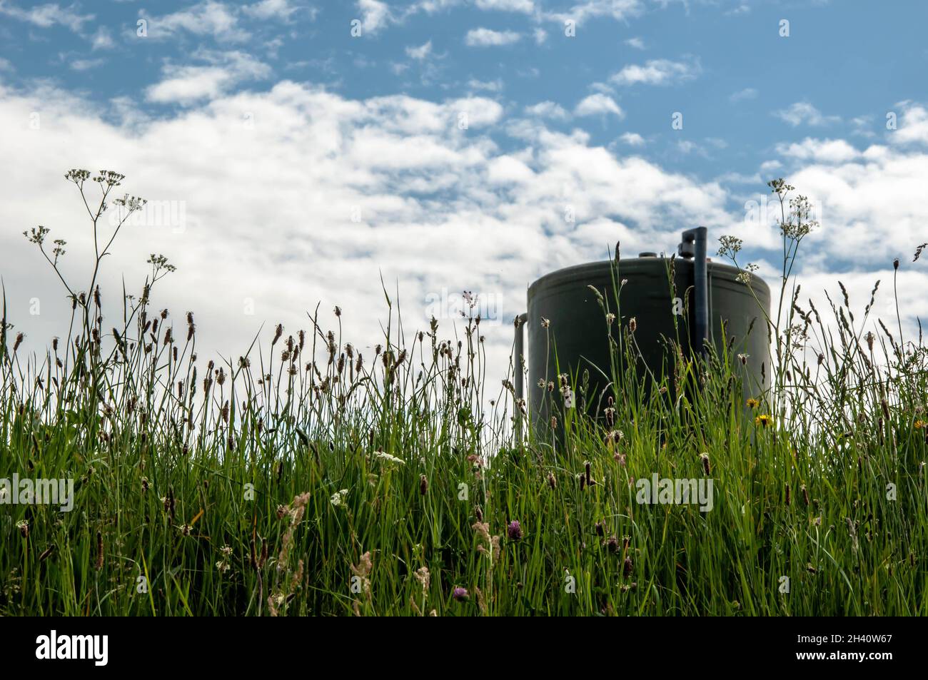 Contrasting Juxtaposition of agricultural or industrial structures as ...