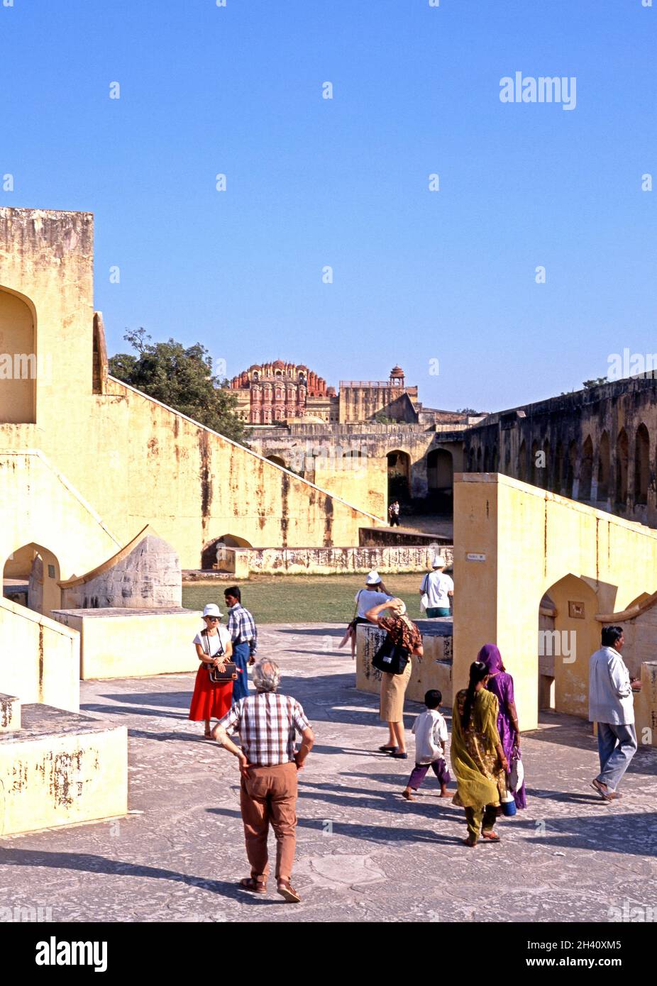 People looking at the giant sundial known as the Samrat Yantra at ...