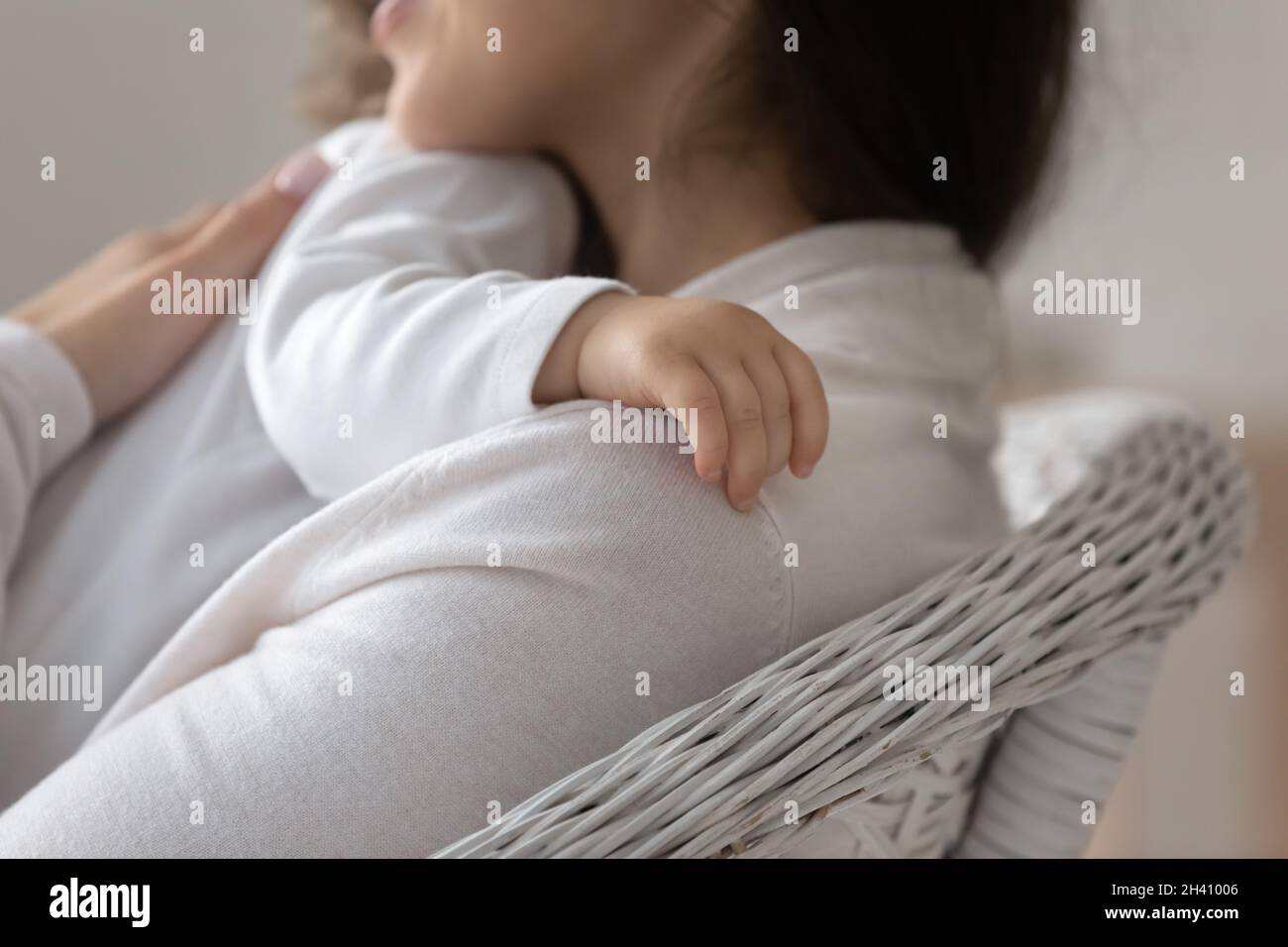 Crop close up loving mother hugging baby, enjoying tender moment Stock ...