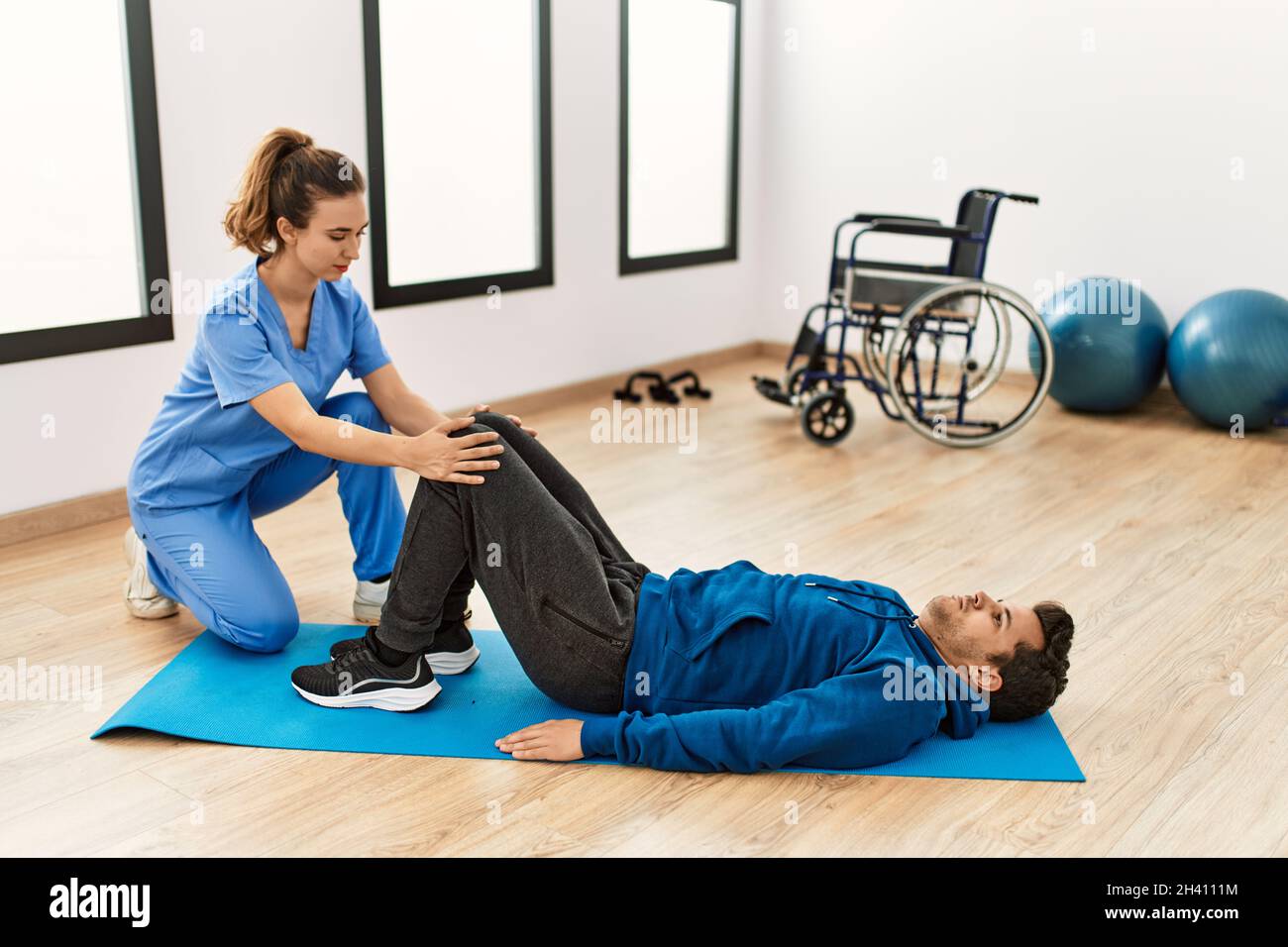 Young disabled man making exercise hi-res stock photography and images ...
