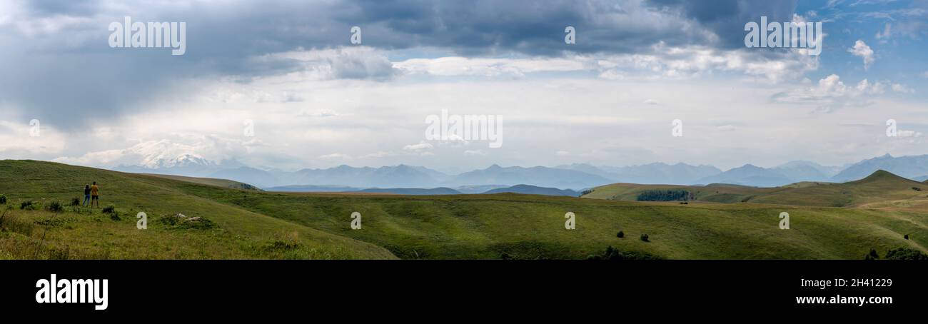 Panorama with mountains, hills and beautiful clouds Stock Photo - Alamy