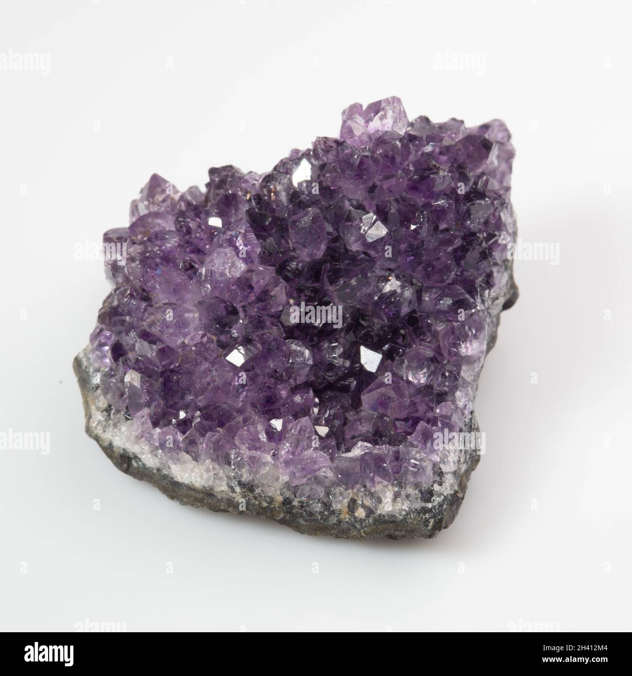 natural violet amethyst druse cluster on white background Stock Photo ...
