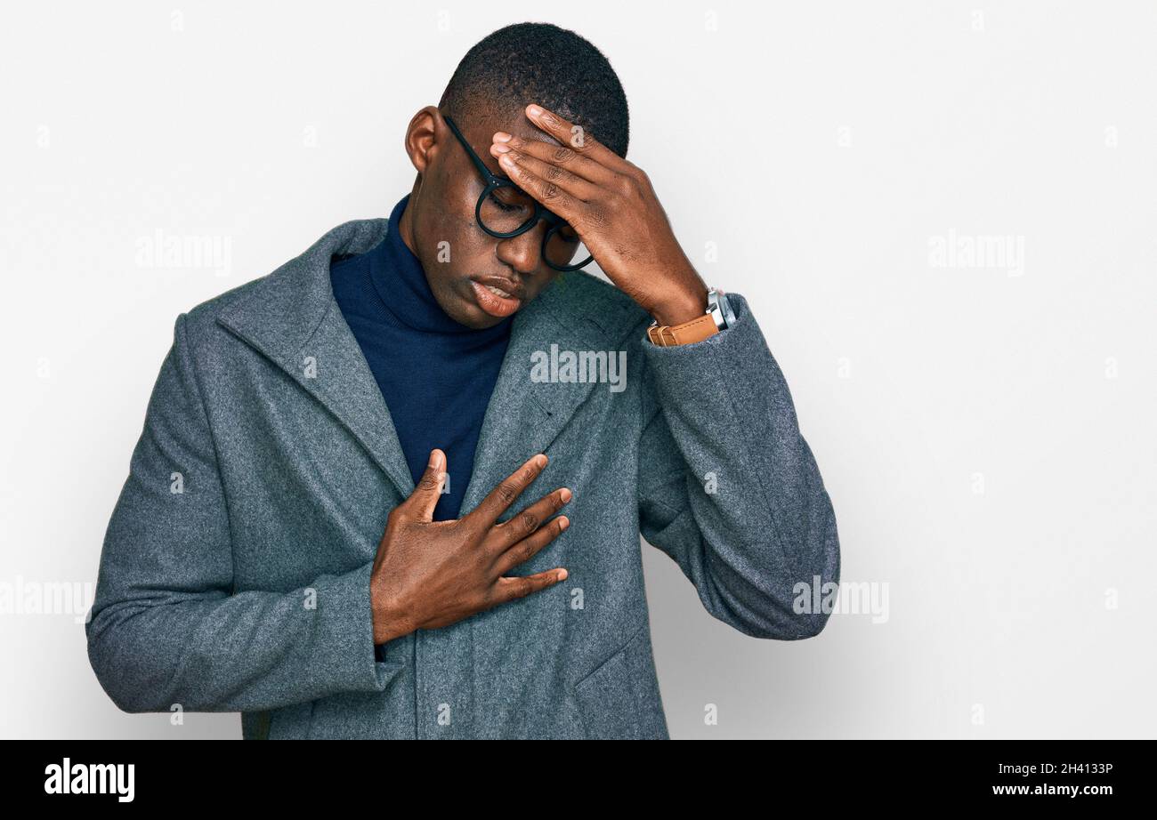 Young african american man wearing business clothes and glasses ...