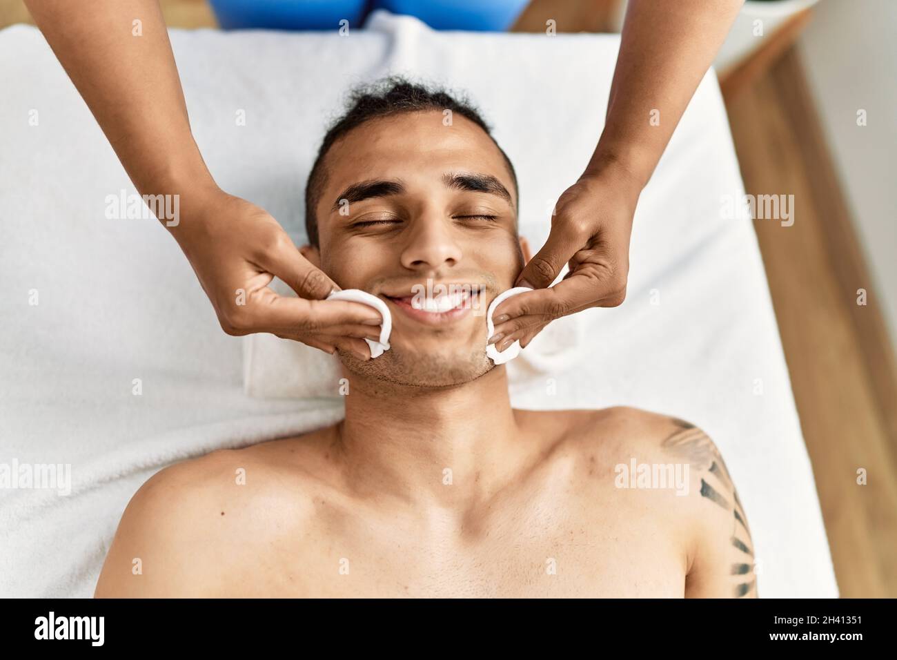 Woman cleaning skin face at beauty center Stock Photo - Alamy