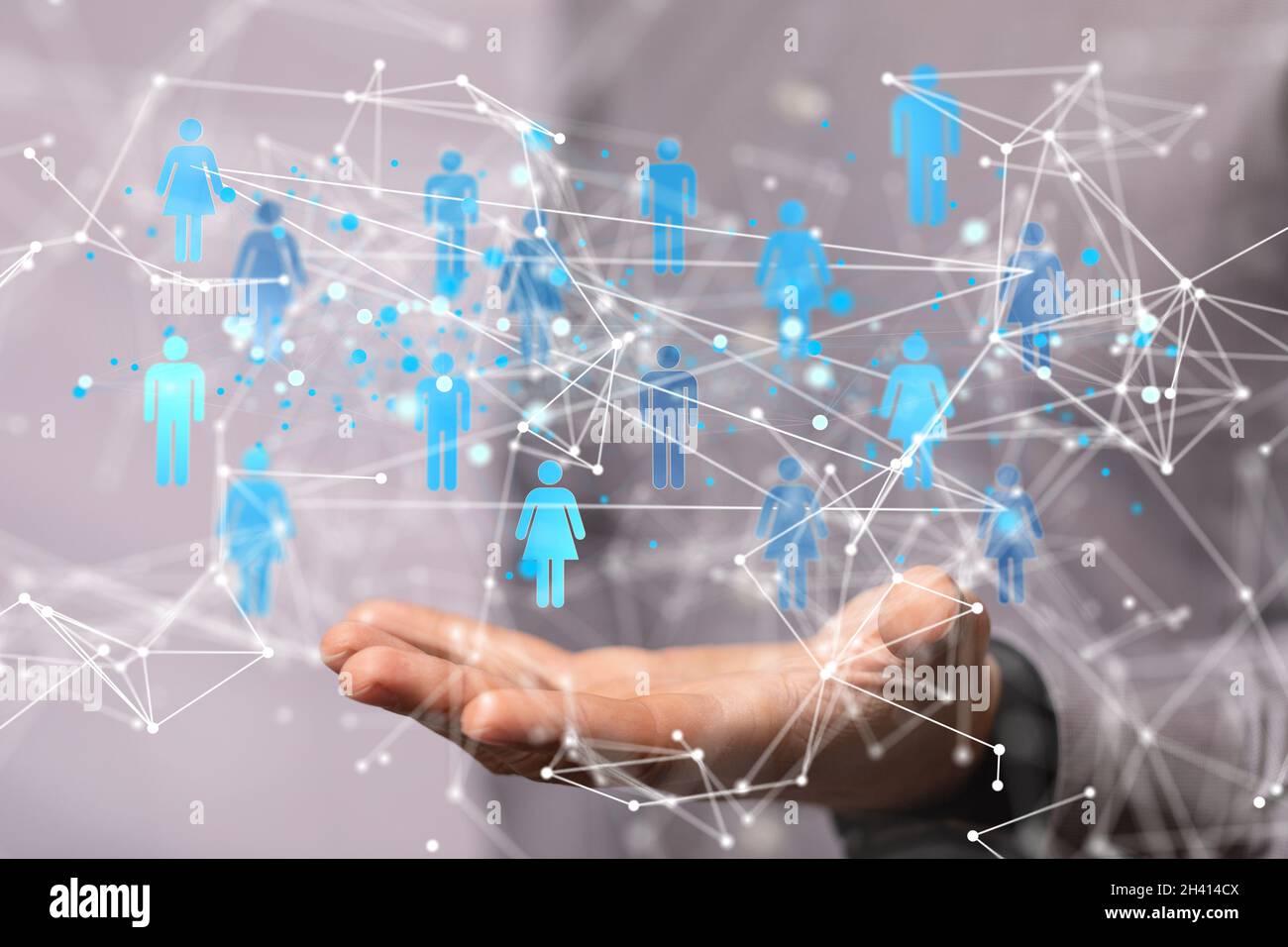 A 3D rendering of a group of floating people icons on a businessman's ...