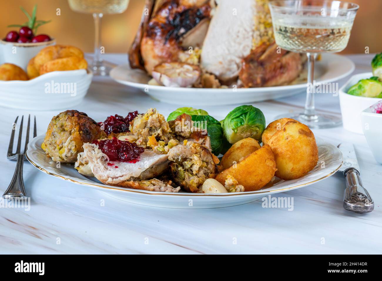 Traditional Christmas dinner with roasted turkey, apricot and pistachio ...