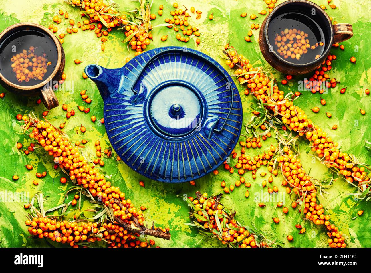 Seasonal tea with sea buckthorn. Fresh tea from autumn berries Stock ...