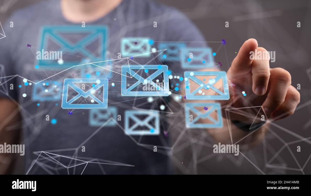 A 3D rendering of a man pointing at floating email icons - Concept of ...