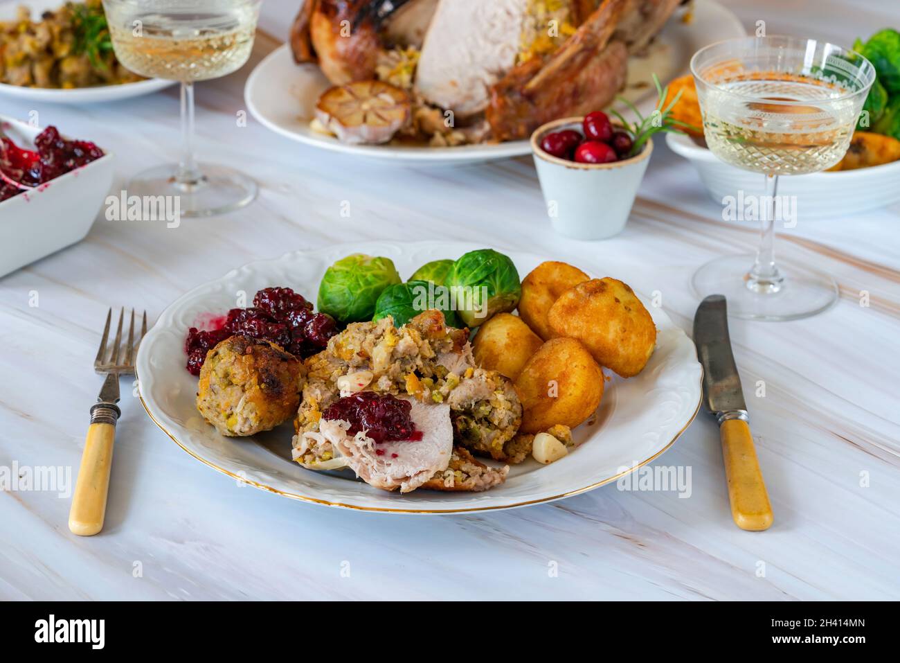 Traditional Christmas dinner with roasted turkey, apricot and pistachio ...