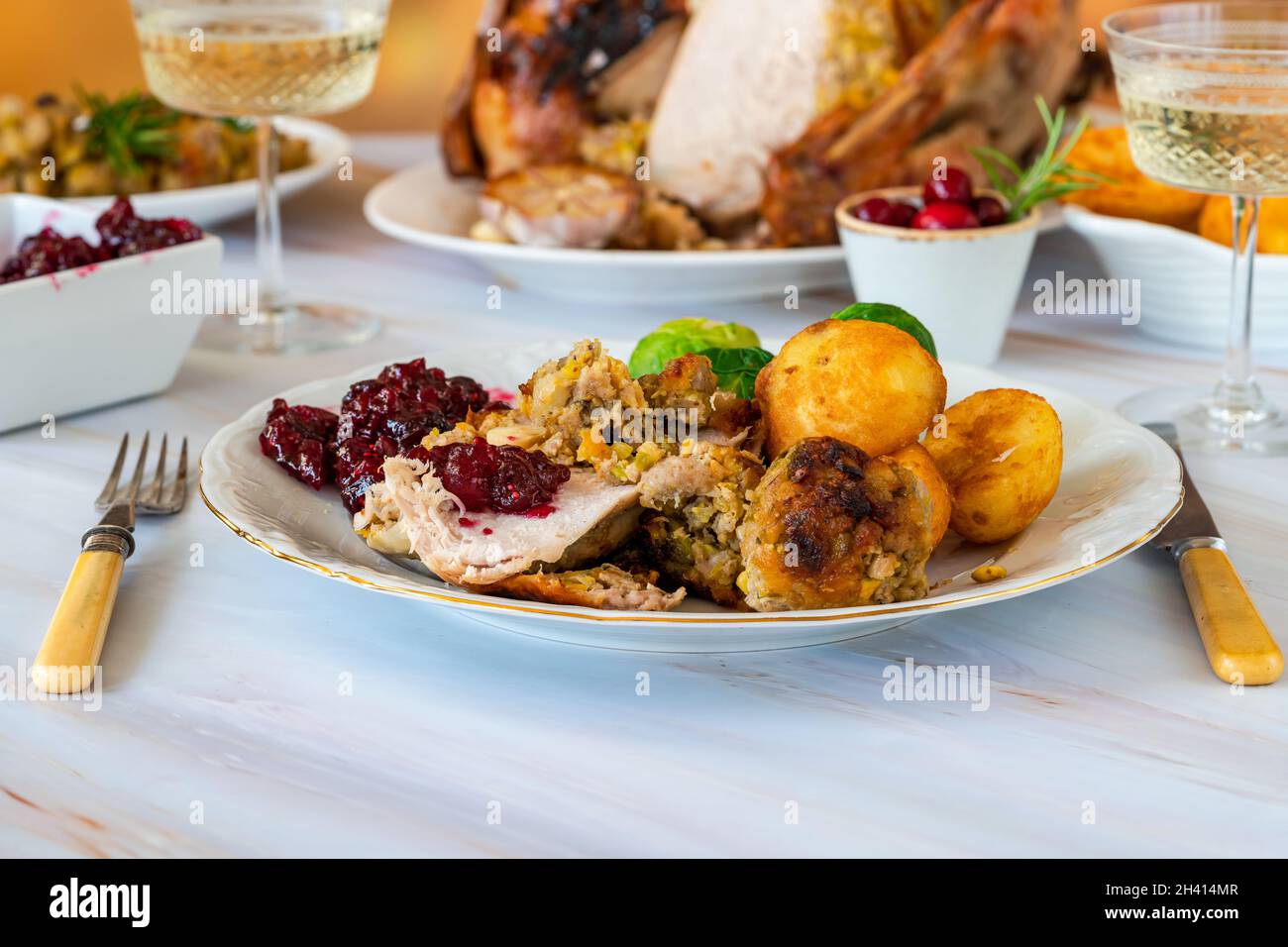 Traditional Christmas dinner with roasted turkey, apricot and pistachio ...