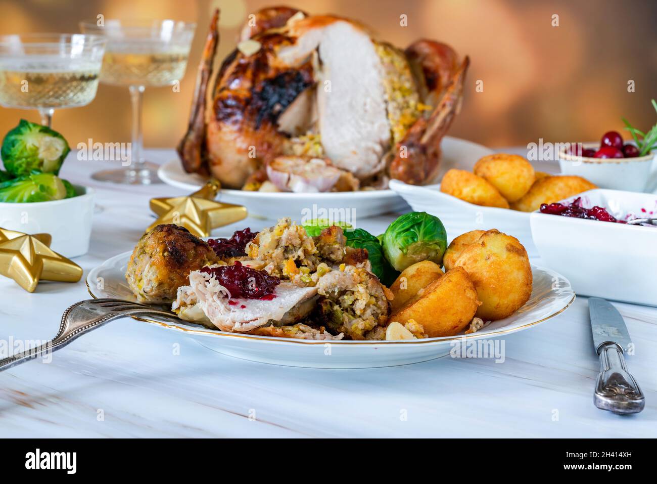 Traditional Christmas dinner with roasted turkey, apricot and pistachio ...