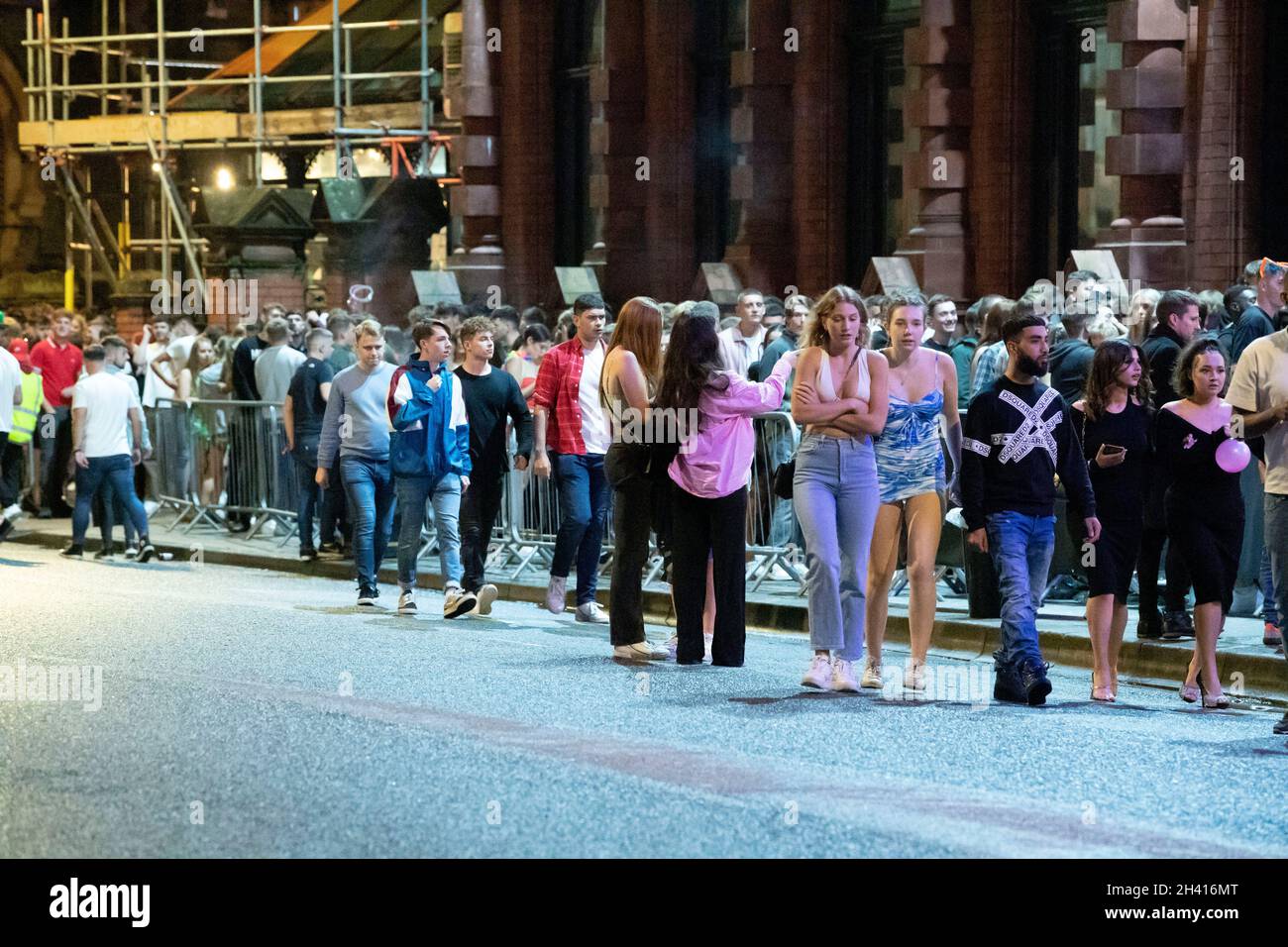 People queue outside a nightclub in Cardiff City Centre in Cardiff ...