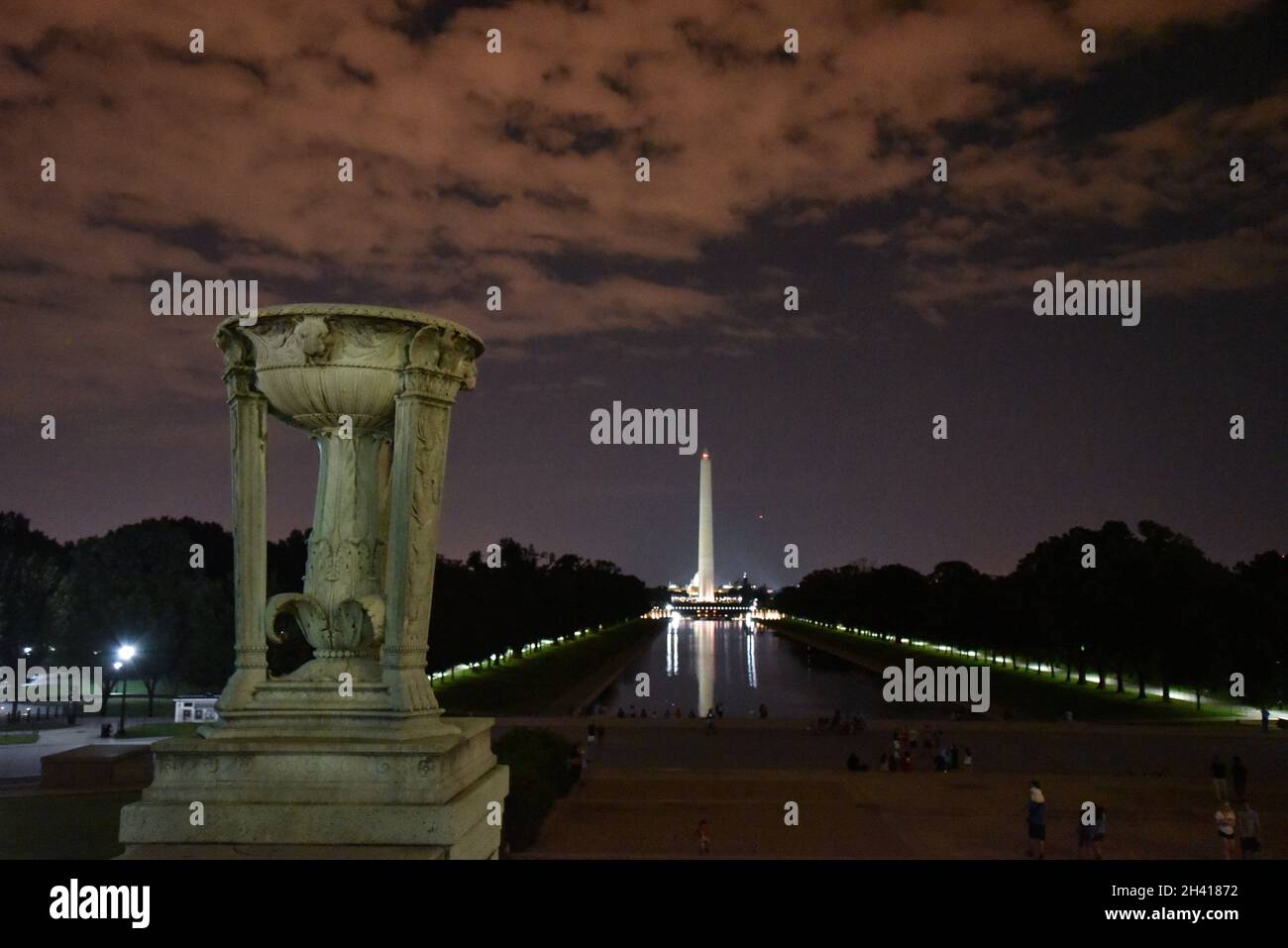 Illuminated Washington monument at night from the stairs of Lincoln ...