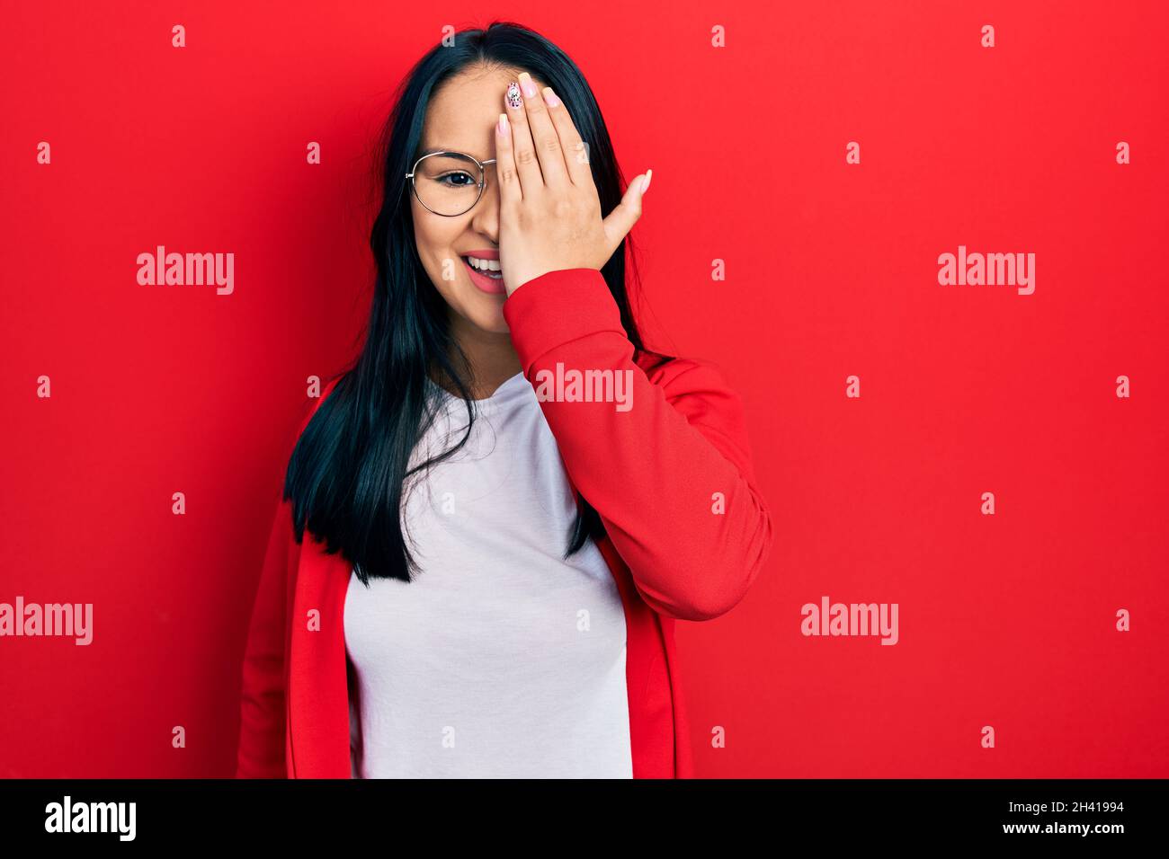 Beautiful hispanic woman with nose piercing wearing casual look and ...