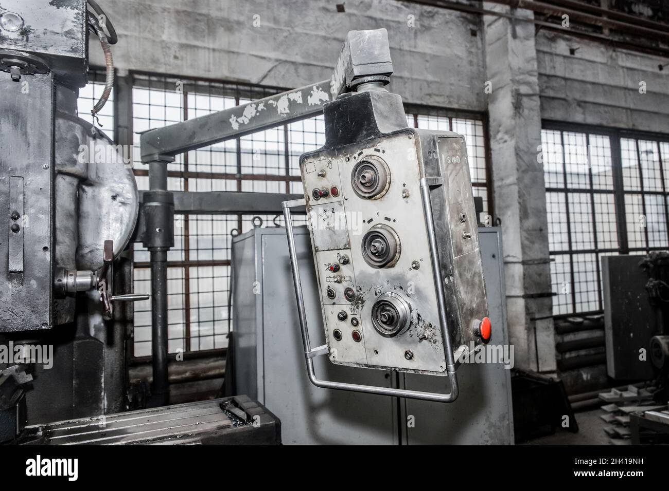 Old control panel of milling machine equipment in the workshop of ...