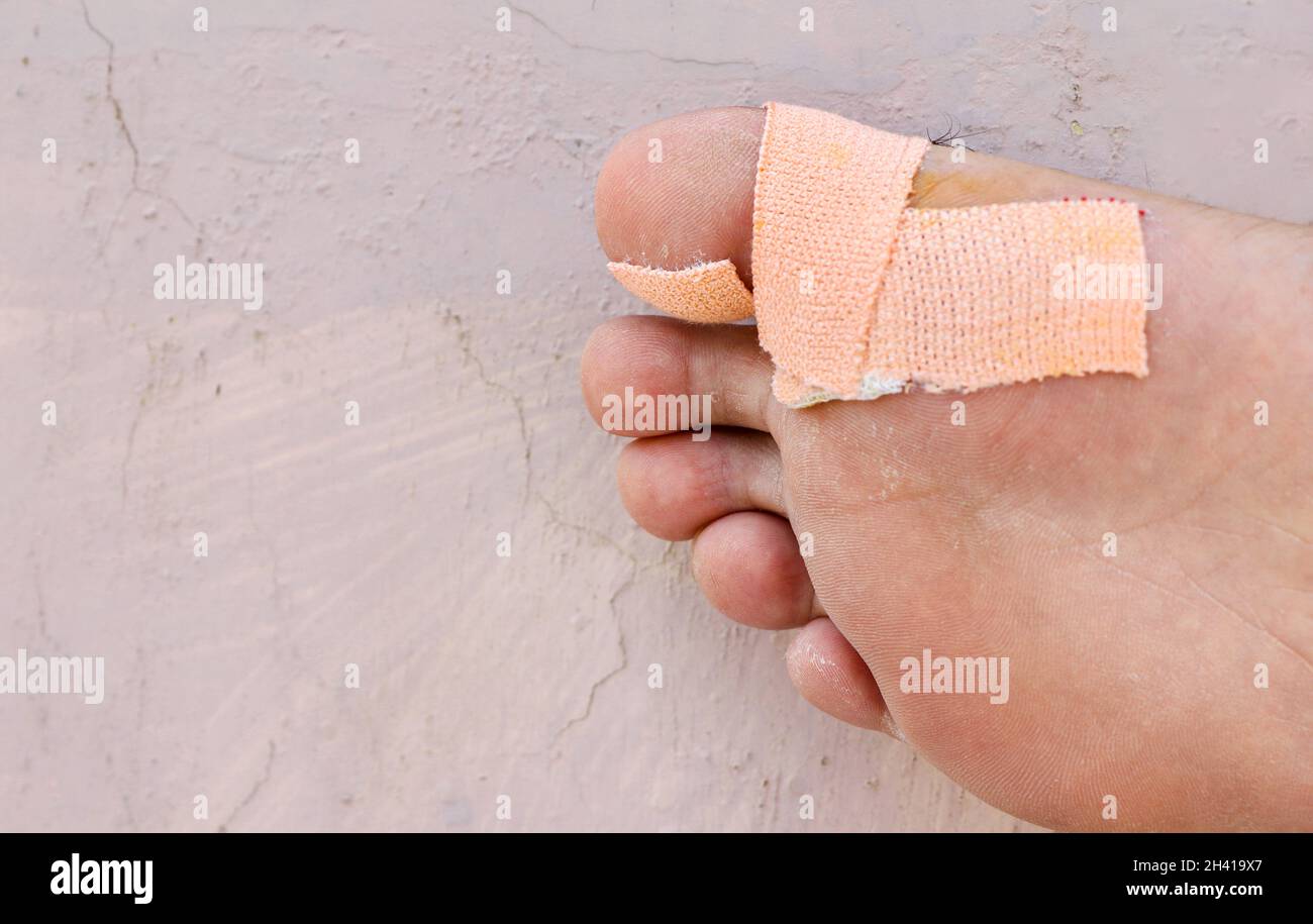 A close up of bandage on boy big toe. intended selective focused Stock ...