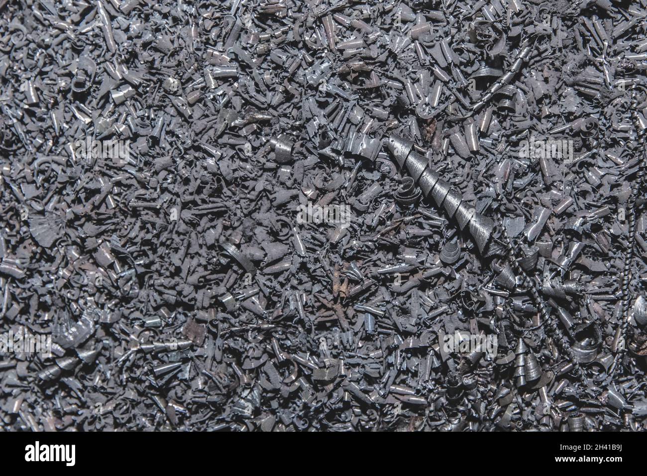 Pile of metal shavings background, industrial iron waste and steel ...