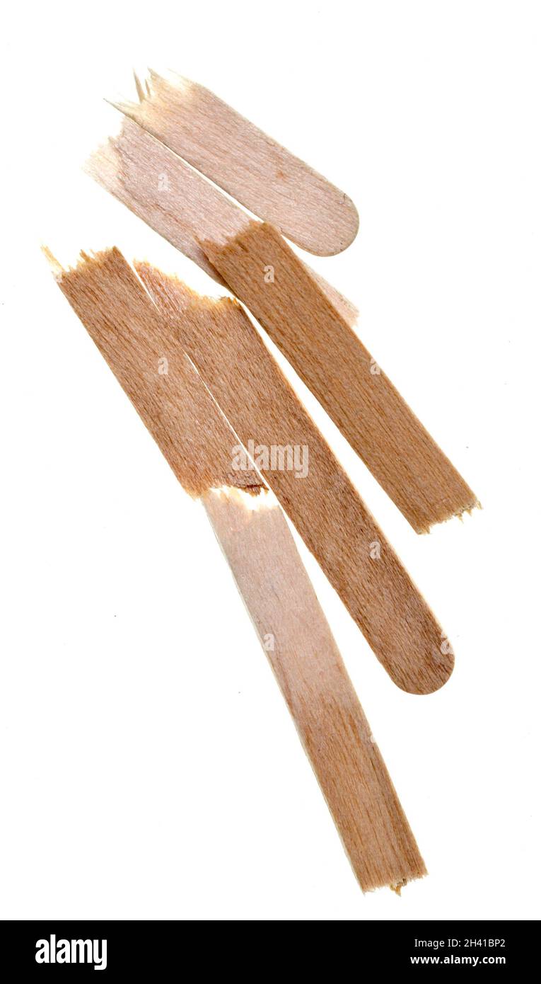 Broken sticks isolated on white background Stock Photo - Alamy