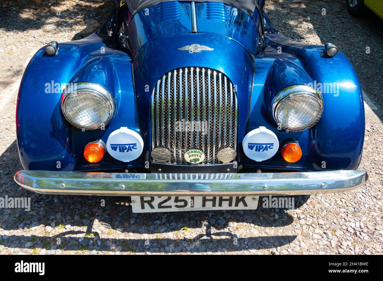 front view of blue Morgan +4 motor car Stock Photo - Alamy