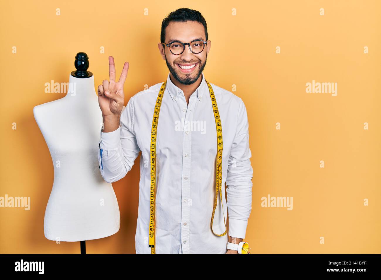 Portrait positive male designer doing hi-res stock photography and ...