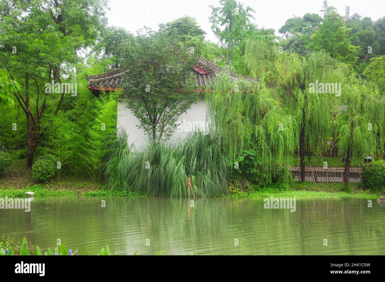 trees and a building within the liu xiang tomb scenic area in chengdu ...