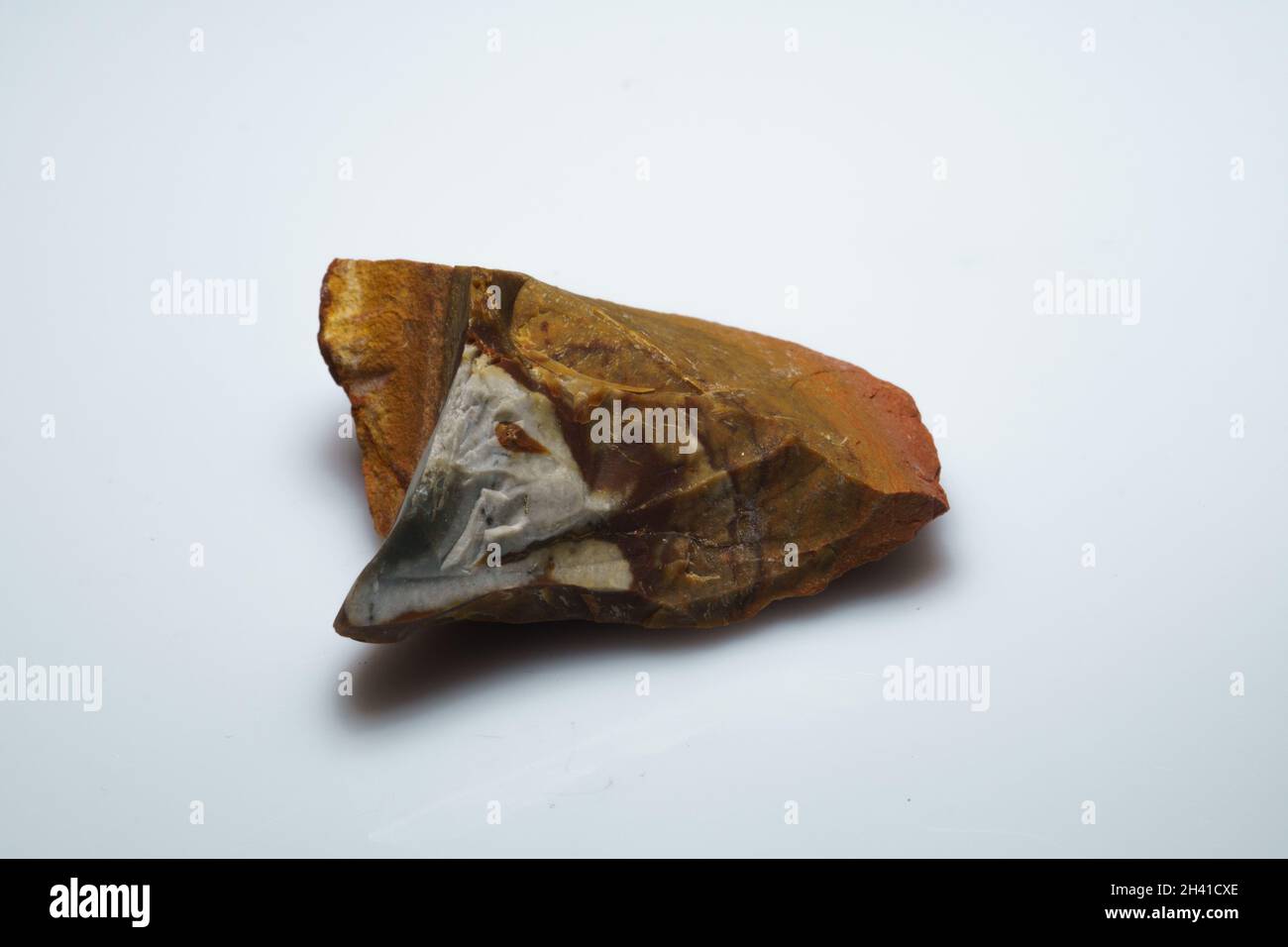 natural jasper mukaite ore on background Stock Photo - Alamy