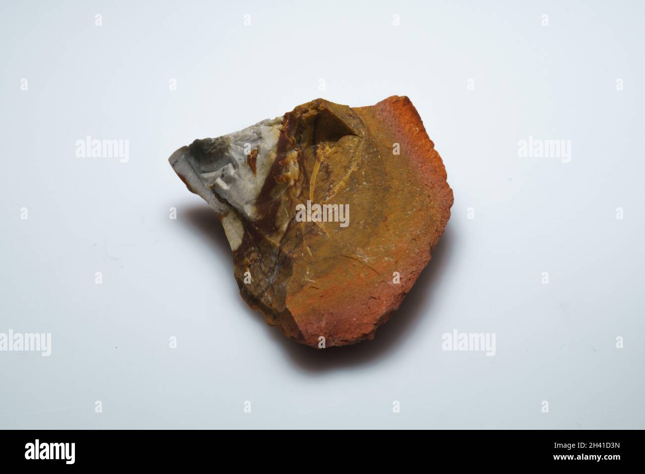 natural jasper mukaite ore on background Stock Photo - Alamy