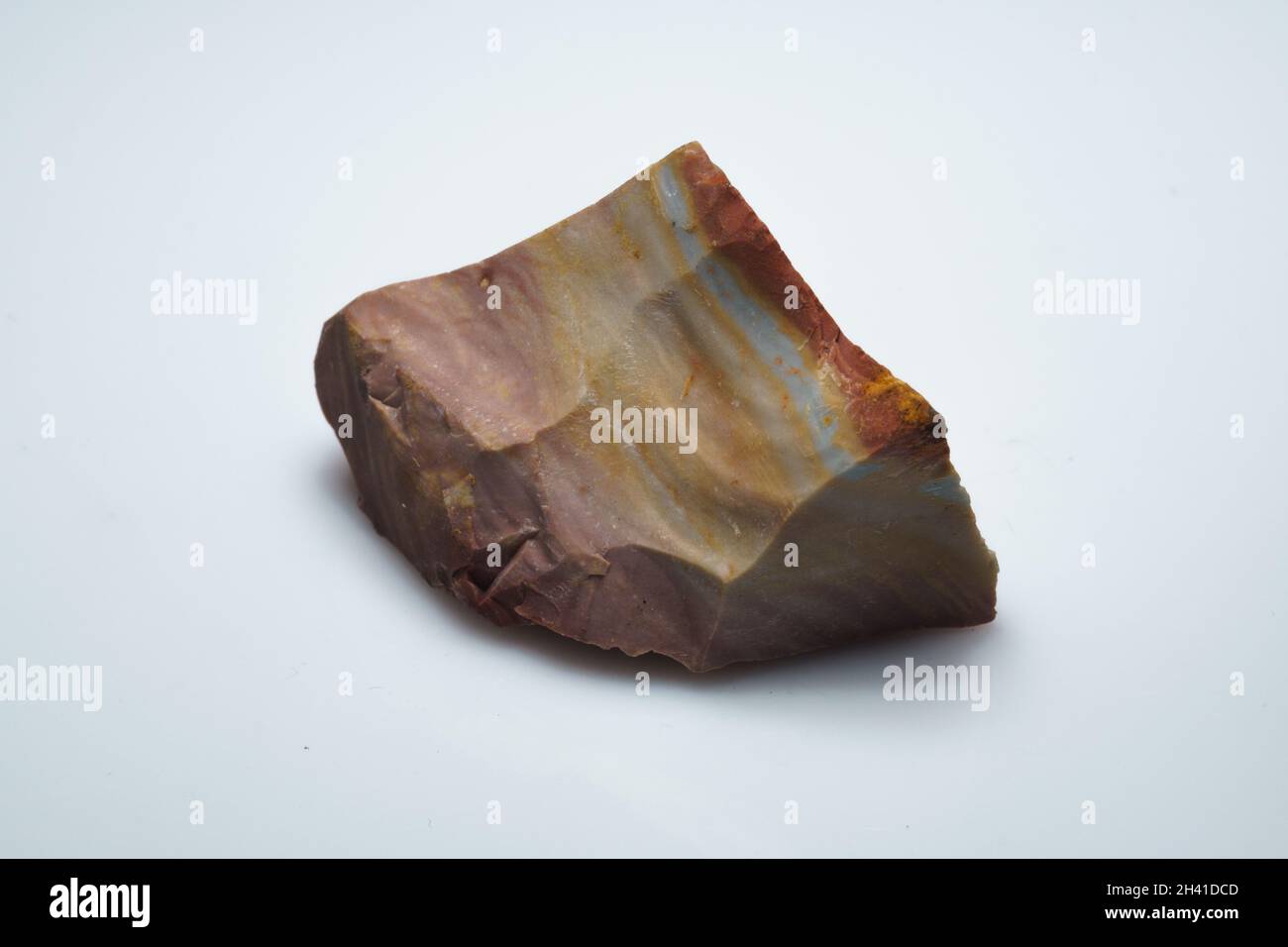 natural jasper mukaite ore on background Stock Photo - Alamy