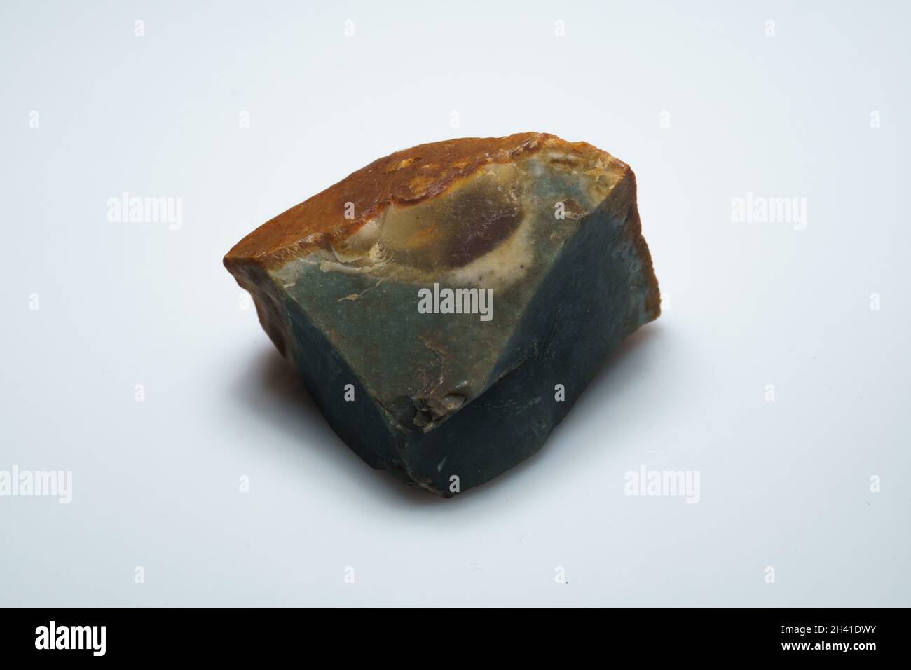 natural jasper mukaite ore on background Stock Photo - Alamy