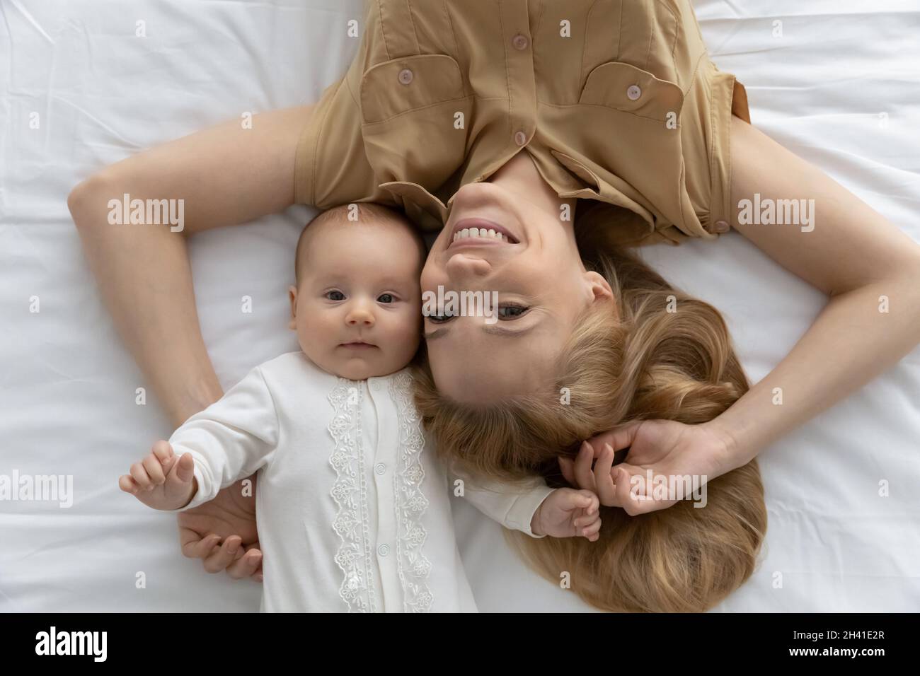 Top view head shot portrait smiling young mother and baby Stock Photo ...