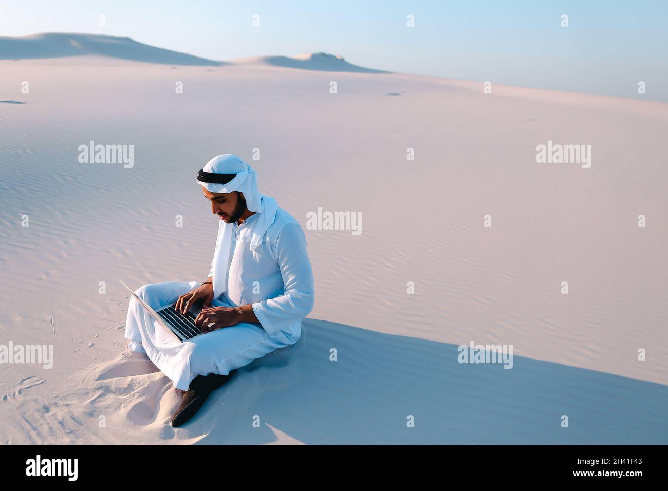 Emirati guy professional designer with computer projects project ...