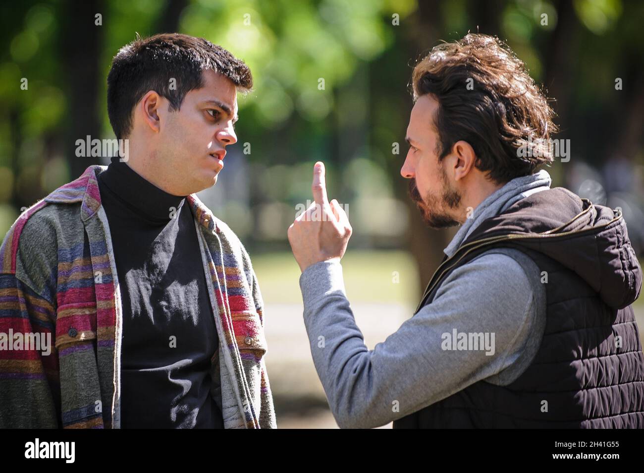 Close-up finger pointing of two very angry, nervous and upset men in an ...