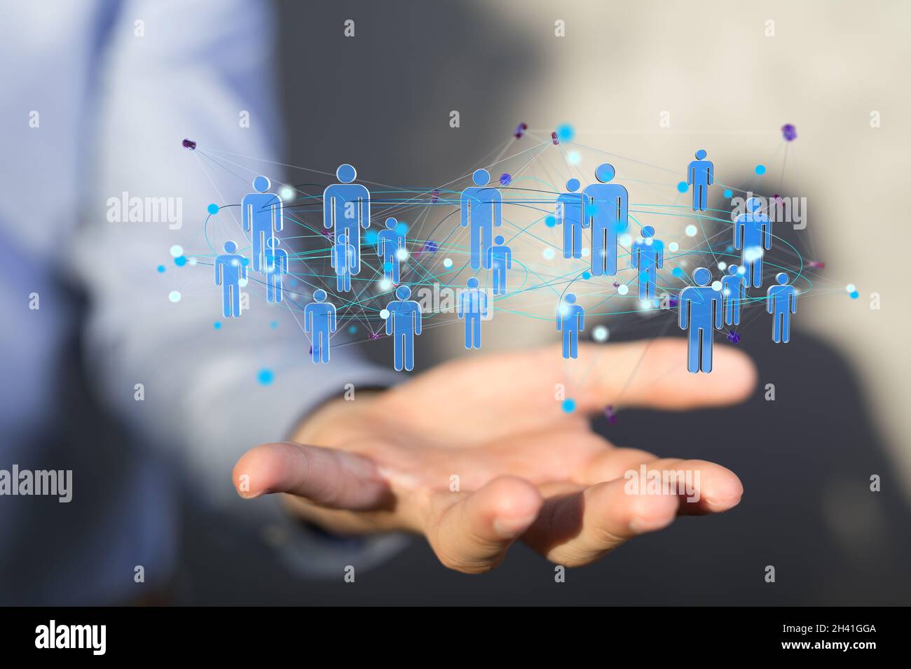 A 3D rendering of a group of floating people icons on a businessman's ...