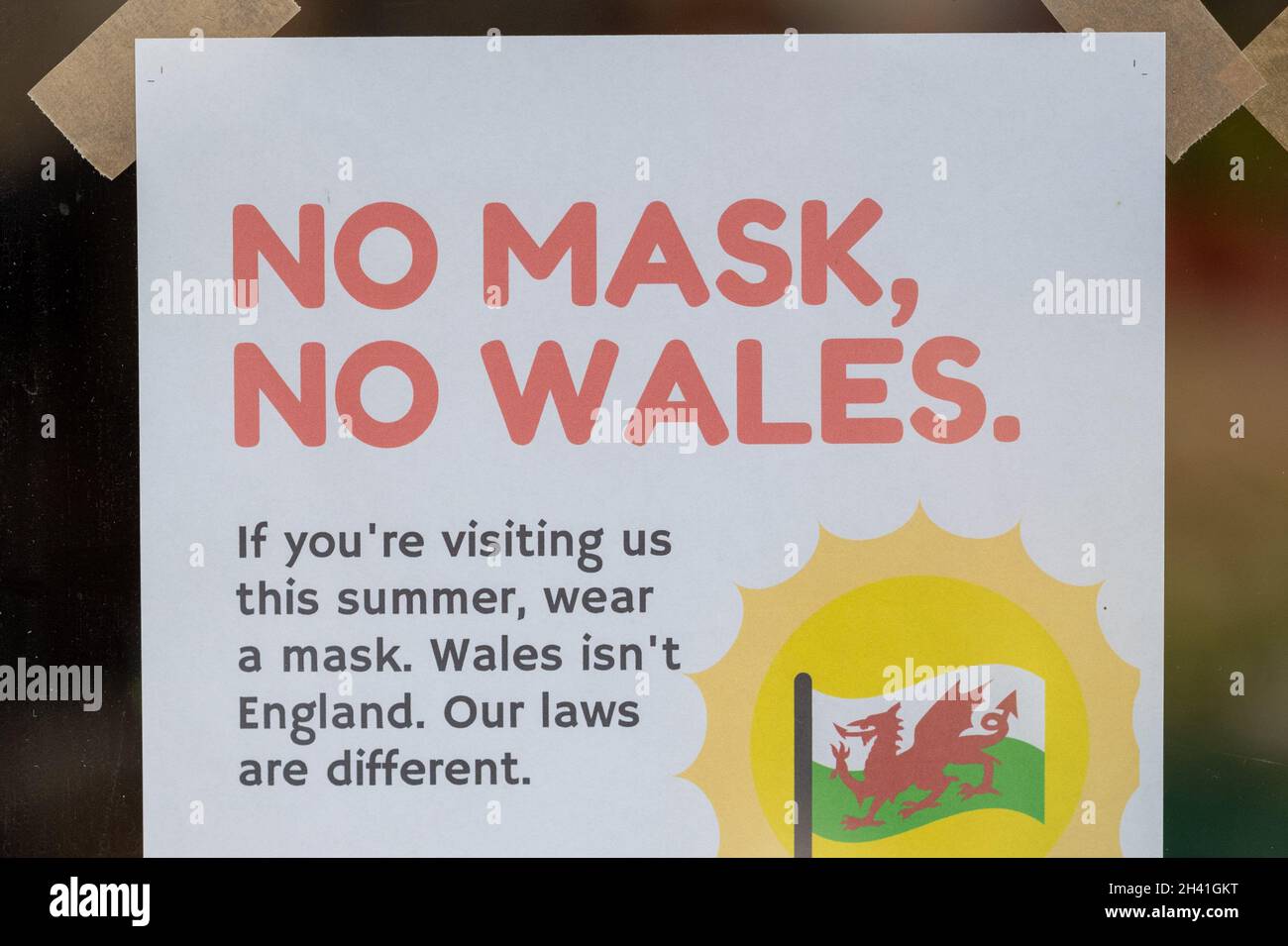 A sign in the window of a shop in Wales warning visitors that laws in ...