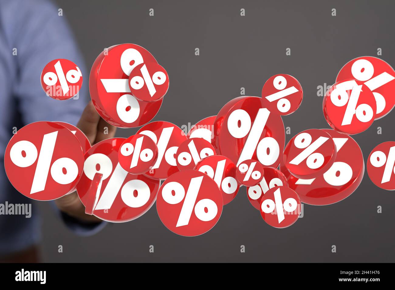 A person presenting the virtual projection of percent signs - sale or ...