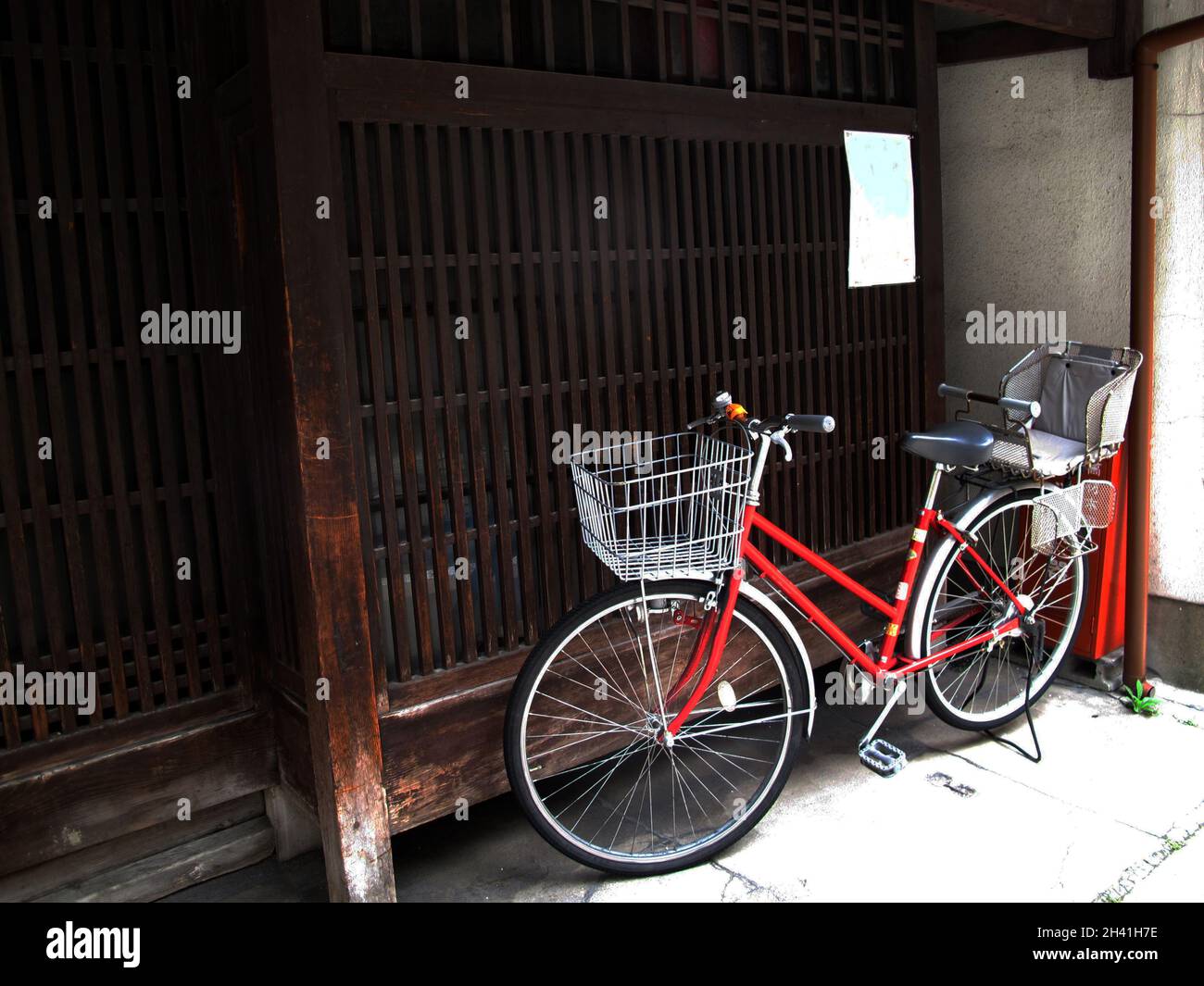 Japanese people riding biking vintage bicycle stop at front of antique ...