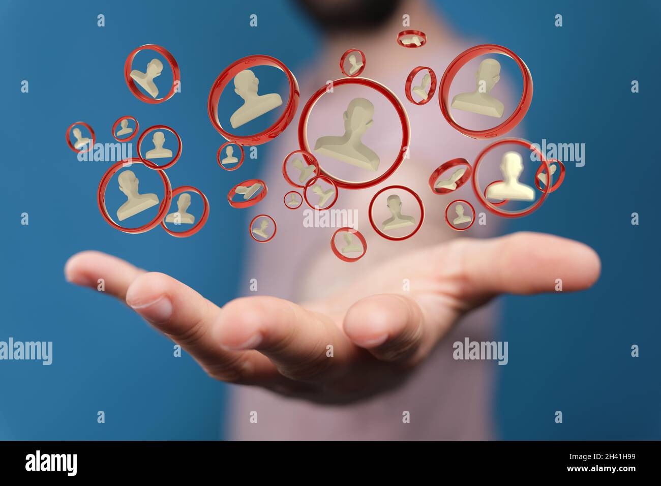 A 3D rendering of a group of floating people icons on a businessman's ...