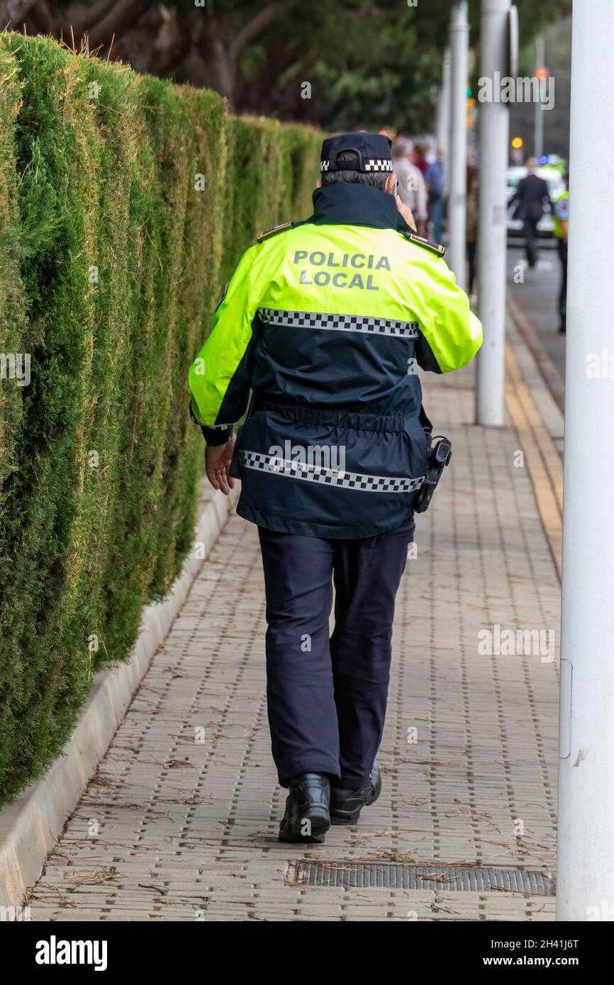 Huelva, Spain - October 30, 2021: Back view of Spanish police with ...