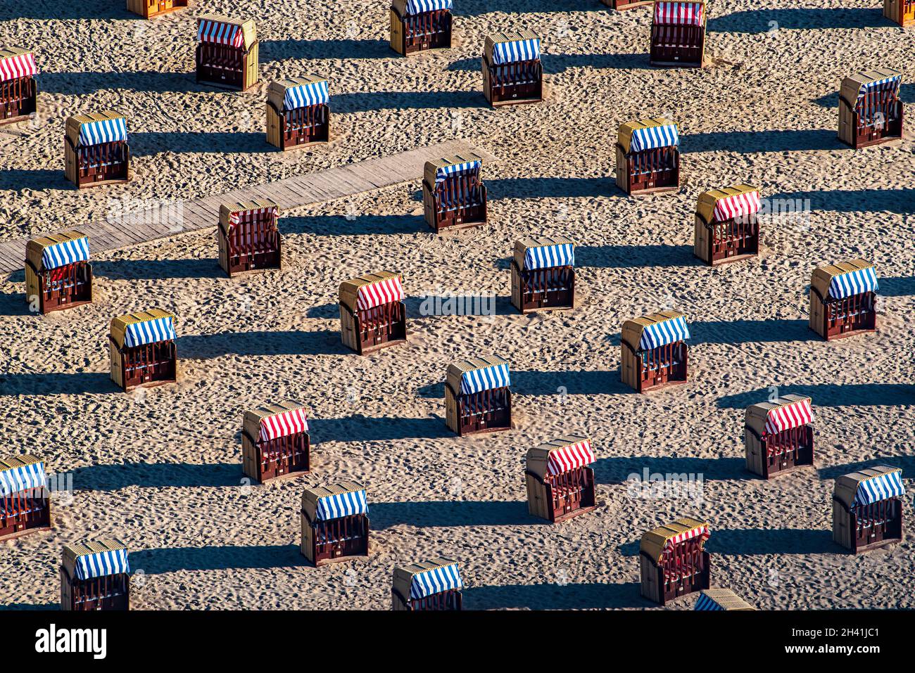 Light and shadows and many beach chairs Stock Photo - Alamy
