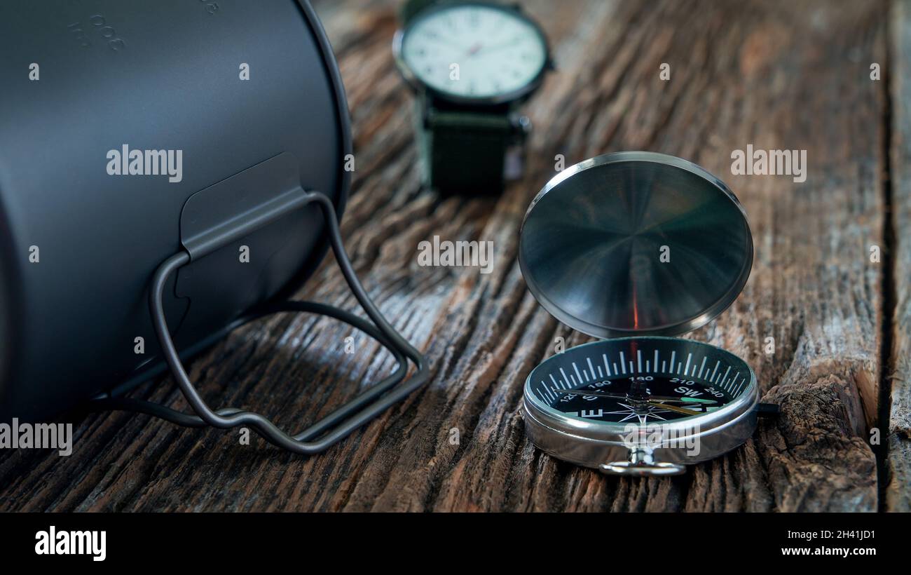 Wooden textured background with compass, mug and watch with space Stock ...