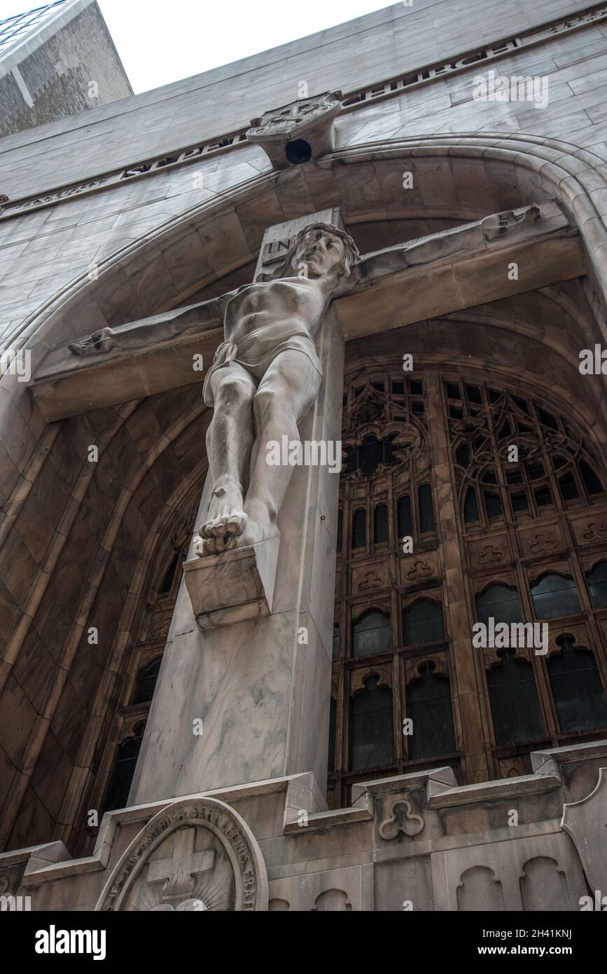 A huge statue of crucified Jesus at the wall of a church in Chicago ...