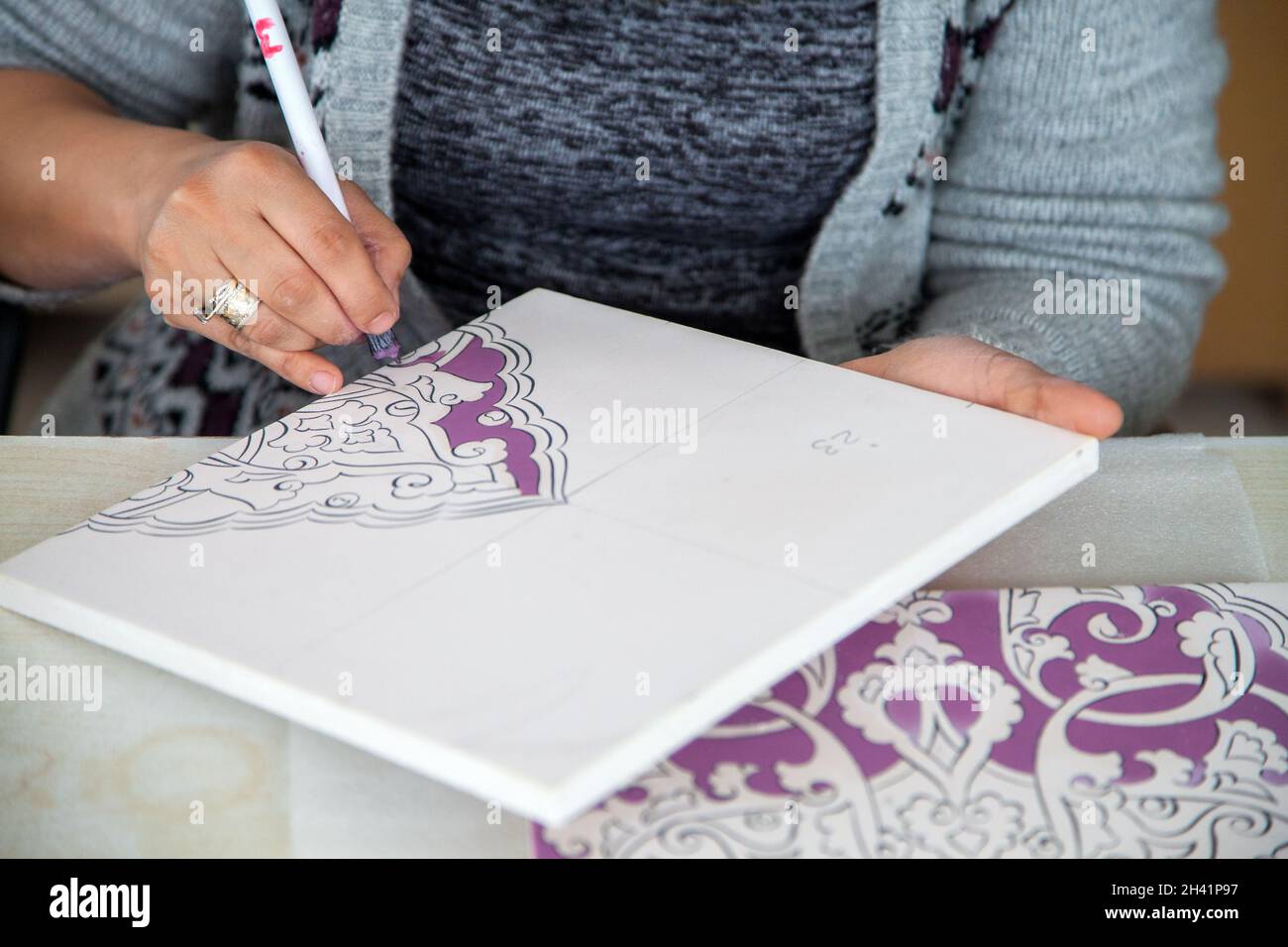 Iznik, Turkey - 12/29/2016: Cini art. Turkish tile art. Female tile ...