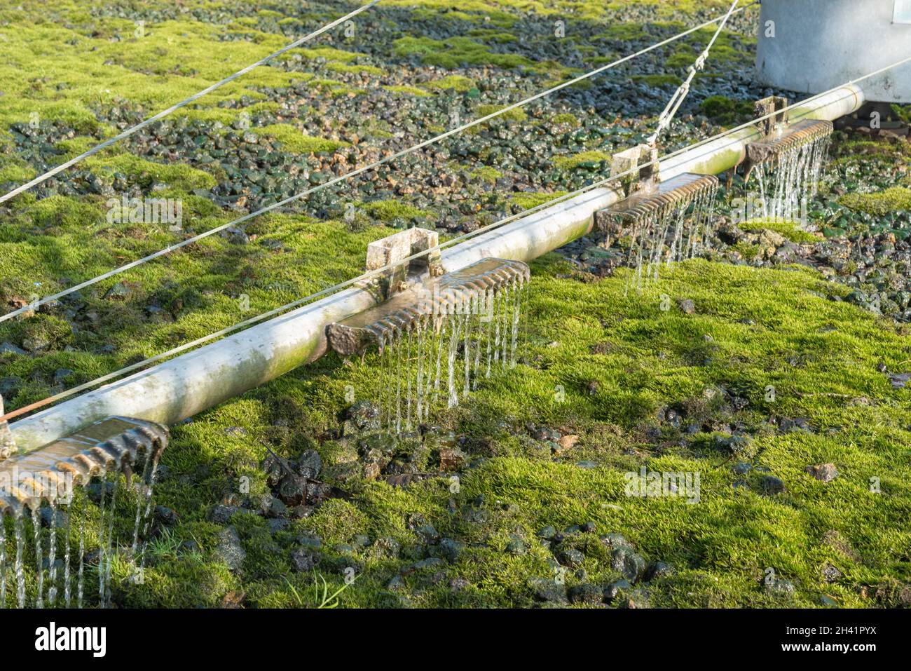 Rotary arm turning over biological filter bed, sewage treatment works ...